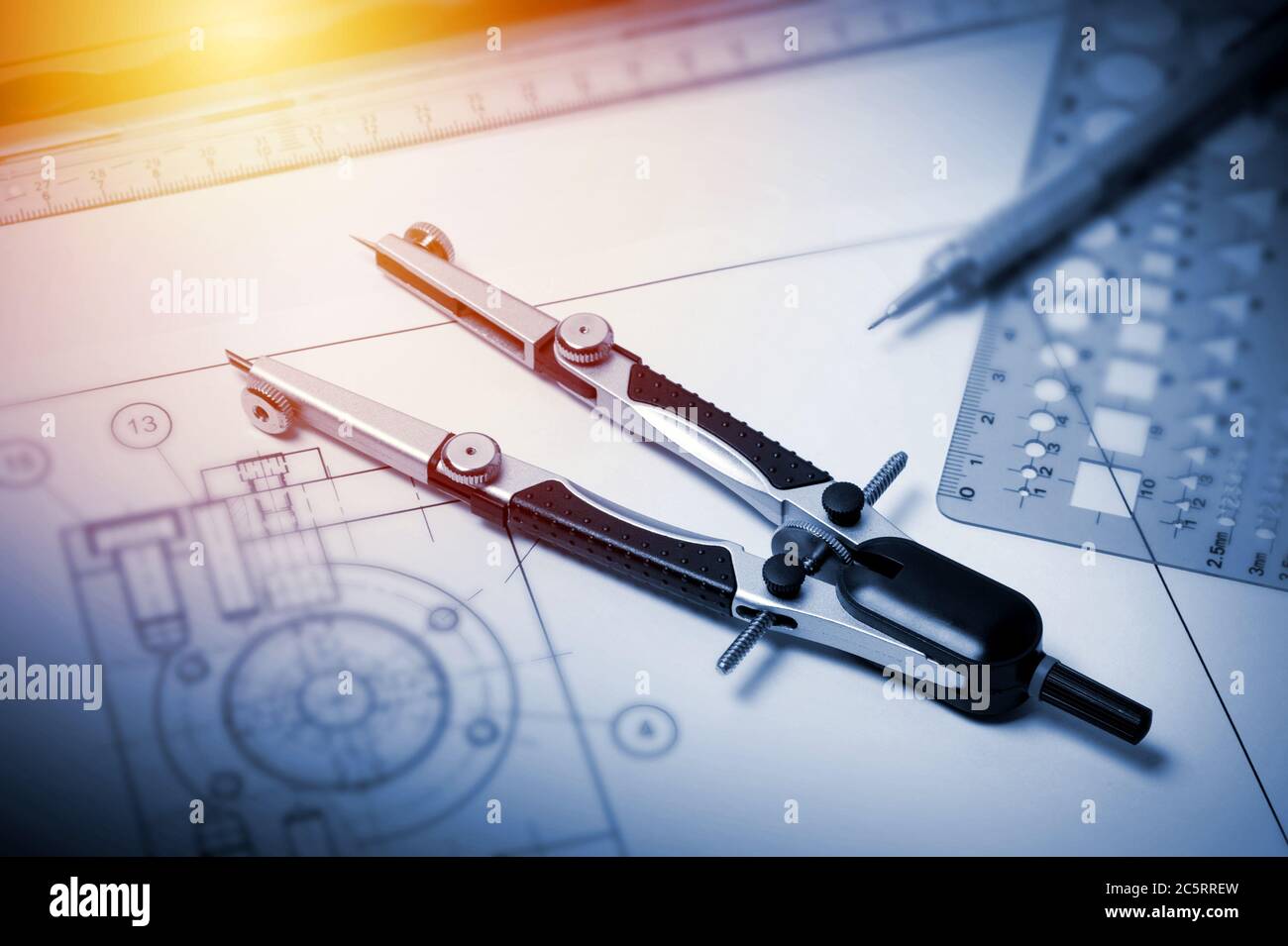 closeup compasses on the engineer's table, tool for industrial drawing ...