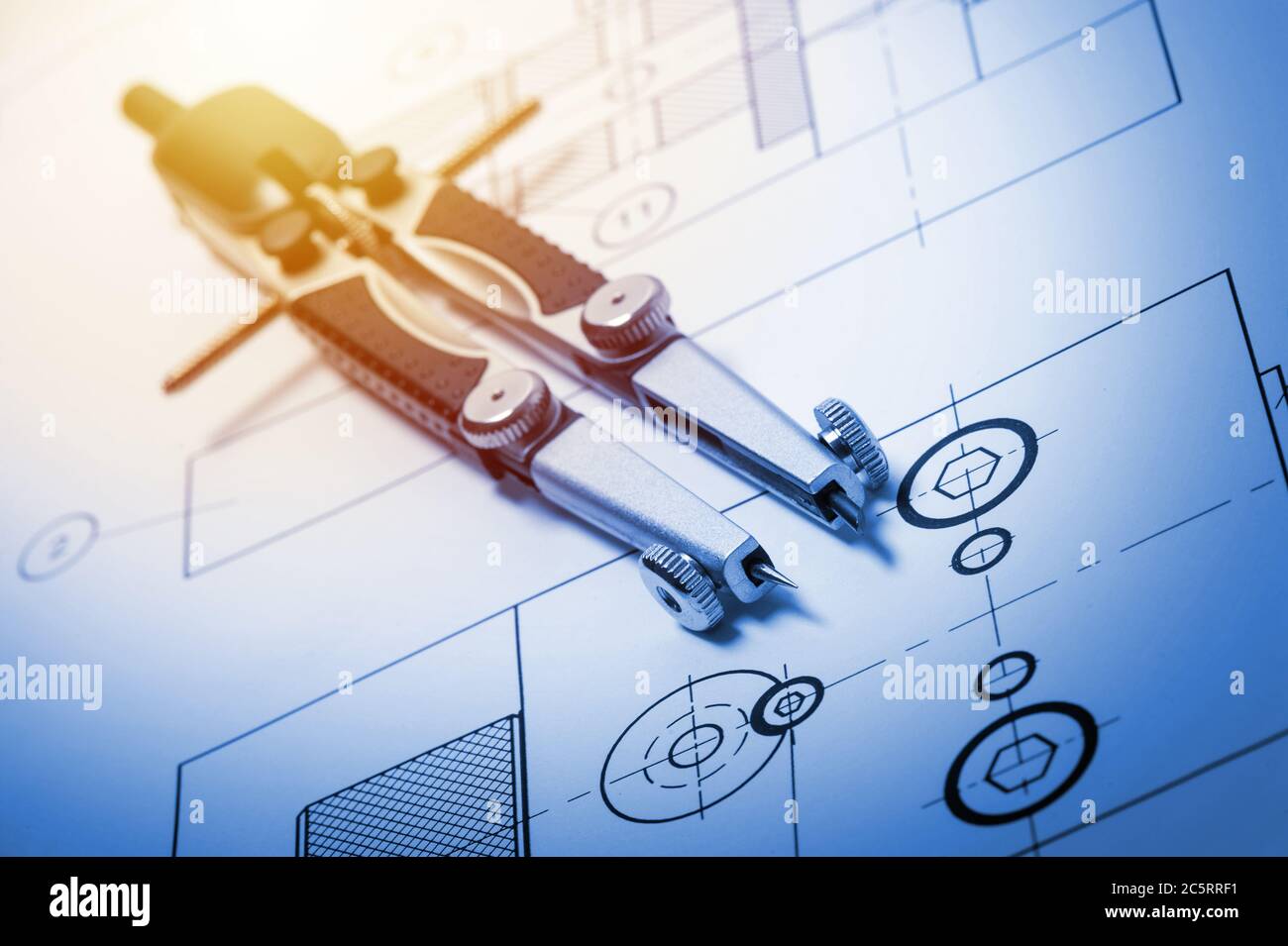 closeup compasses on the engineer's table, tool for industrial drawing ...