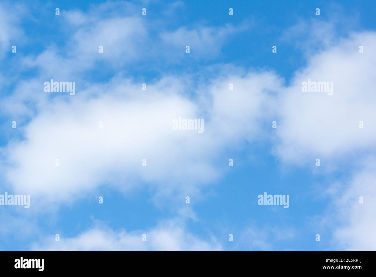 blue sky with flying white light clouds Stock Photo - Alamy