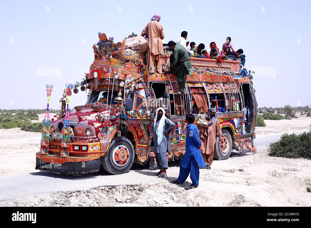 Colorful bus decorated with detailed truck art Stock Photo - Alamy