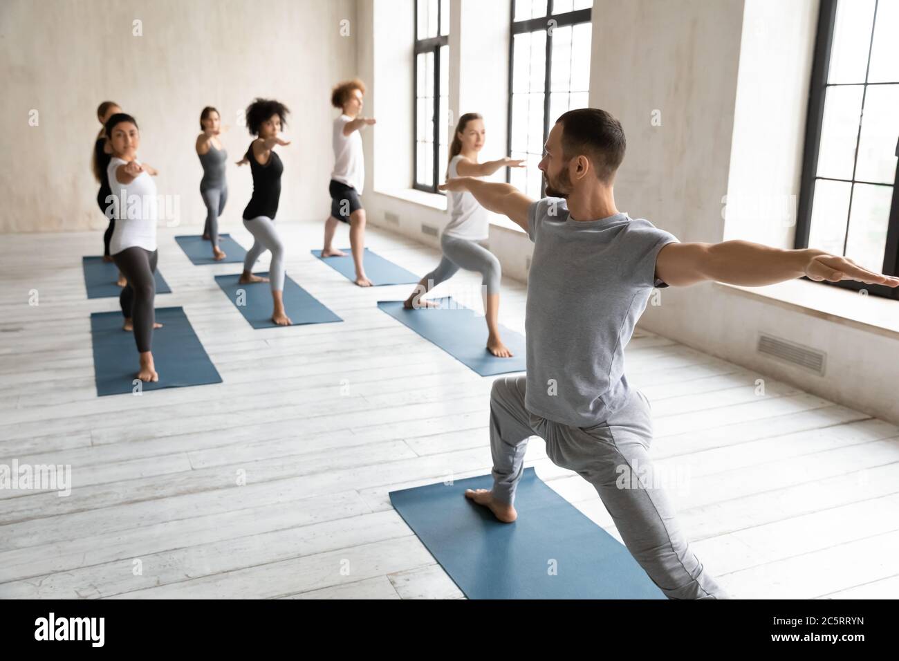 Teaching yoga class hi-res stock photography and images - Alamy