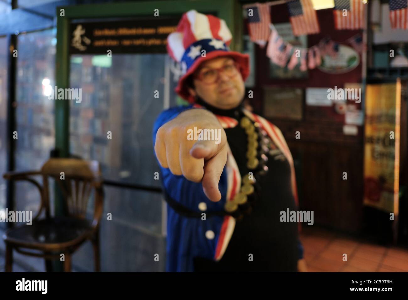 An Israeli man dressed in a particularly patriotic Uncle Sam outfit ...
