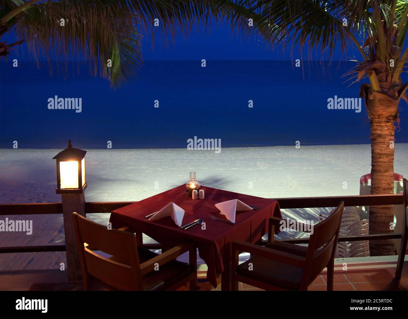 Tropical restaurant on the beach near the ocean Stock Photo - Alamy
