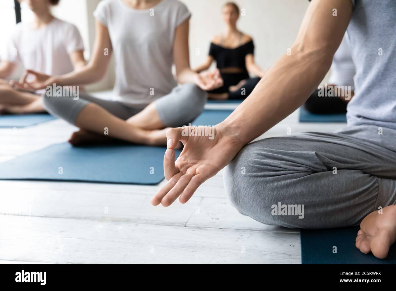 Hand on knee hi-res stock photography and images - Alamy
