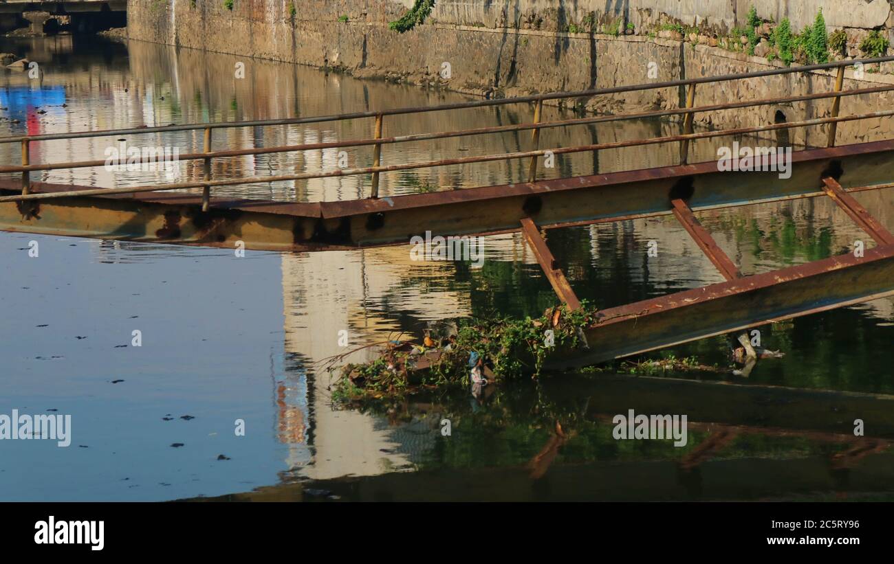 The old and broken bridge over the river in the morning Stock Photo - Alamy