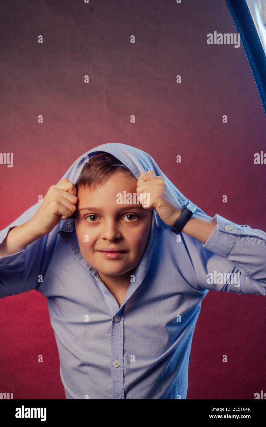 Shirt over head hi-res stock photography and images - Alamy