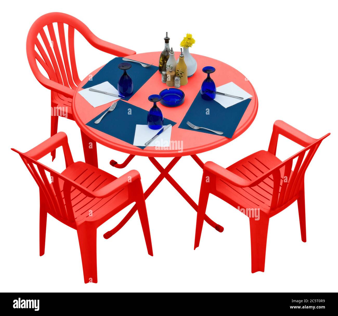 Red plastic table with chairs isolated on white. Clipping path included ...
