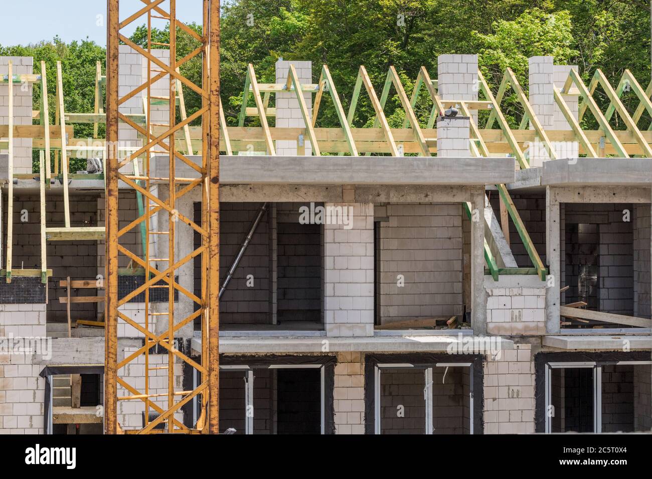 Construction site, building structure, crane, roof beams Stock Photo ...