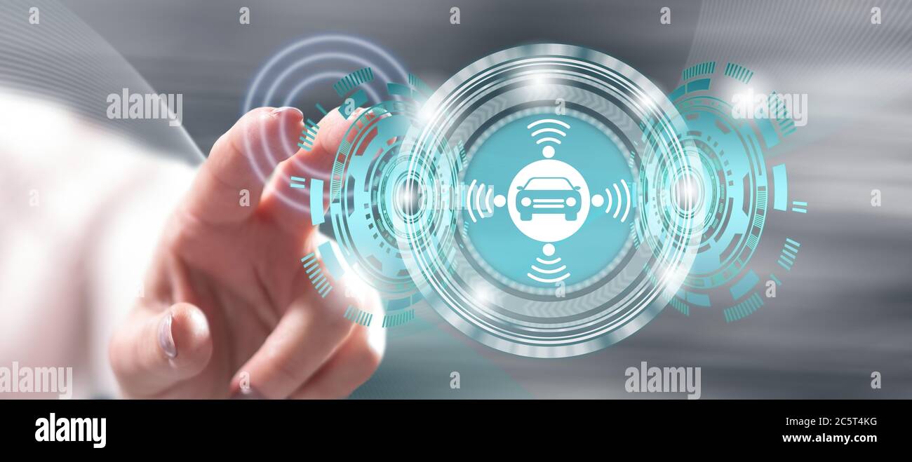 Woman touching a smart car concept on a touch screen with her finger ...
