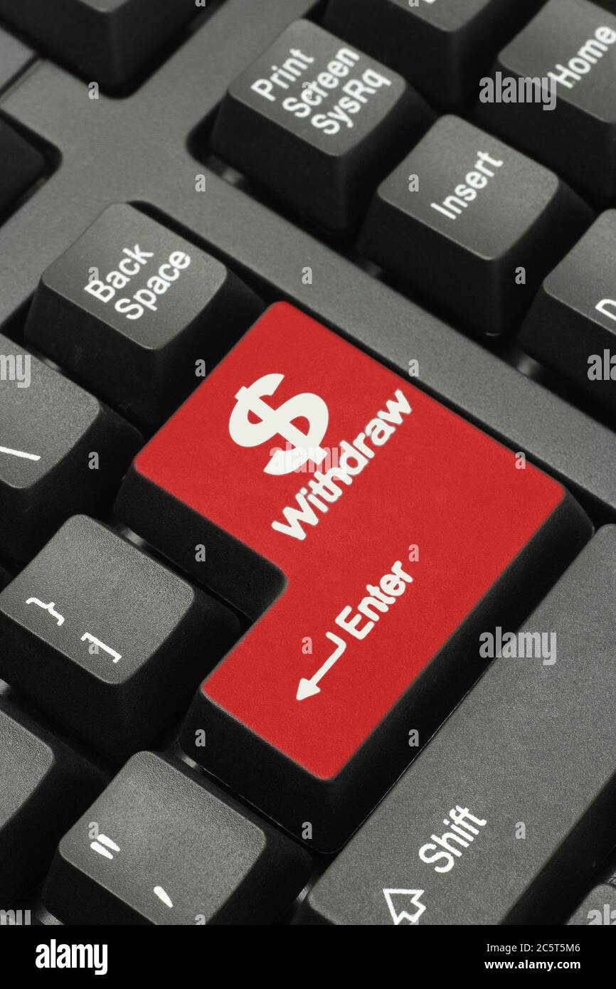 Conceptual Key Board with Withdrawal Function Key Stock Photo - Alamy