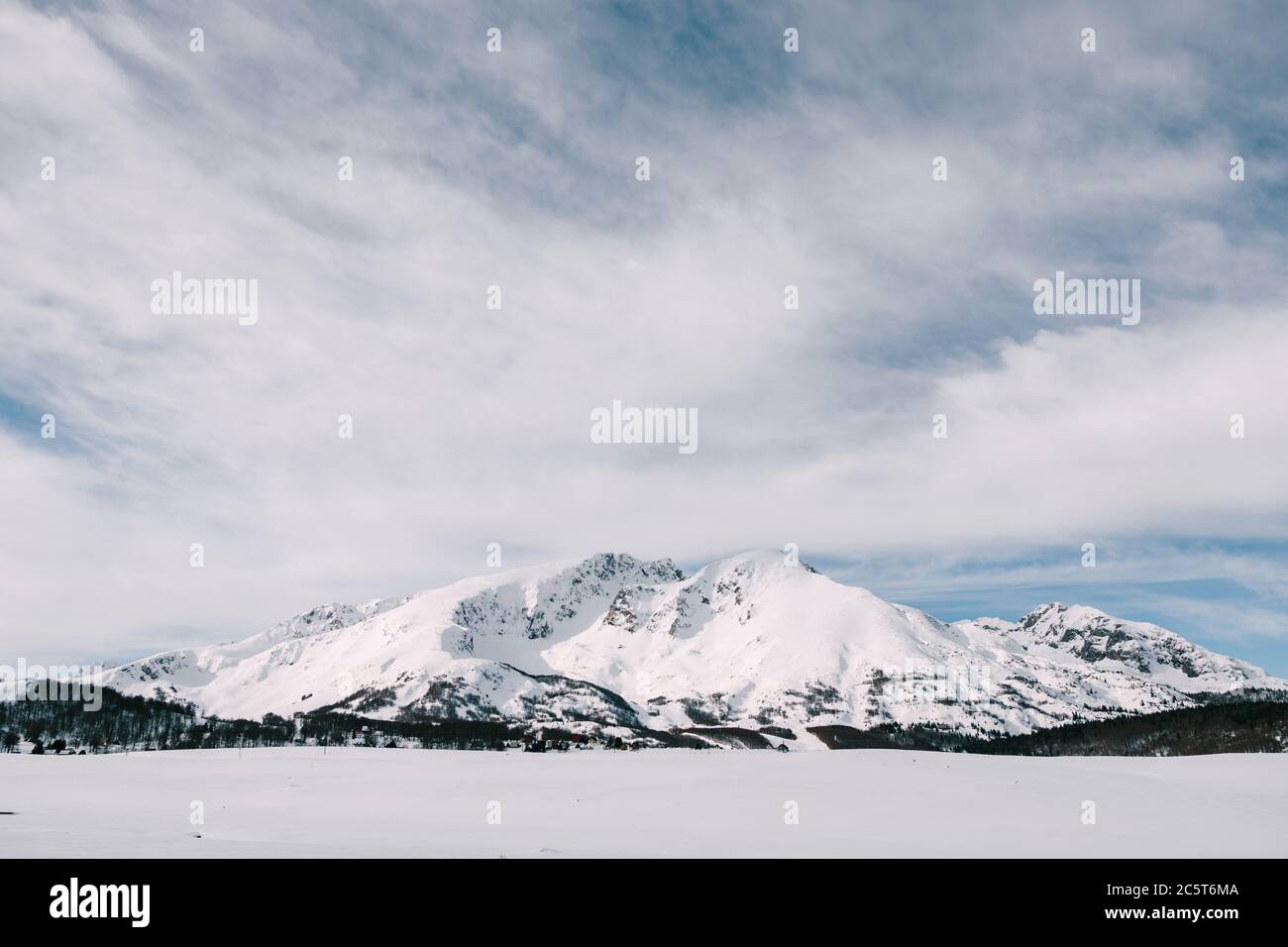 Snow-covered mountain peaks in Zabljak are Durmitor National Park in ...