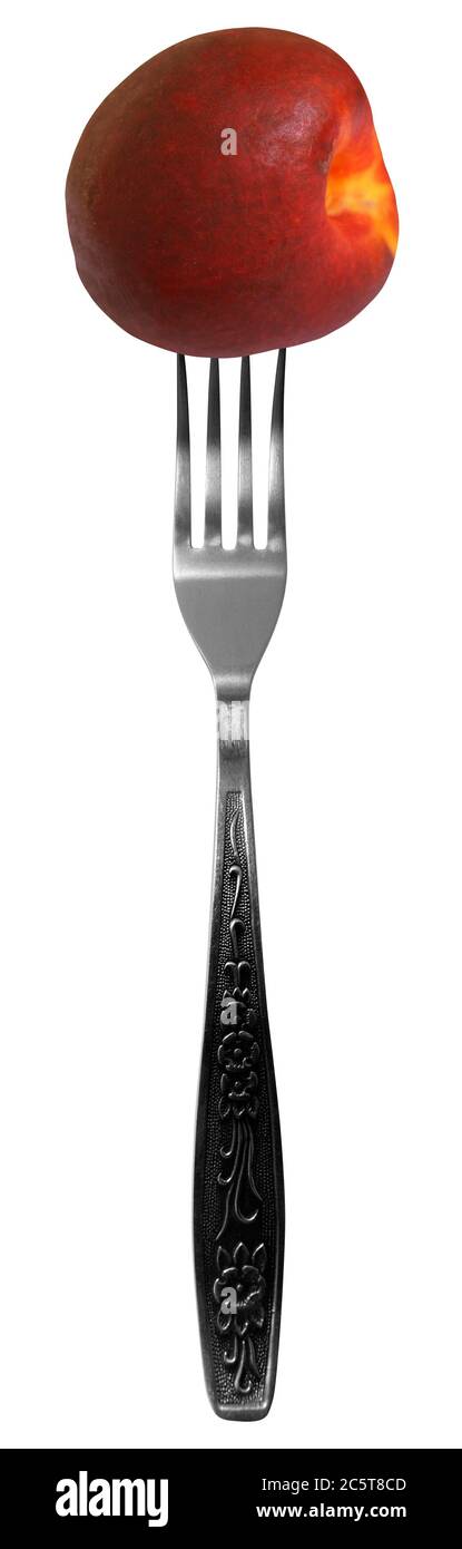 Peach on fork isolated on a white background Stock Photo - Alamy