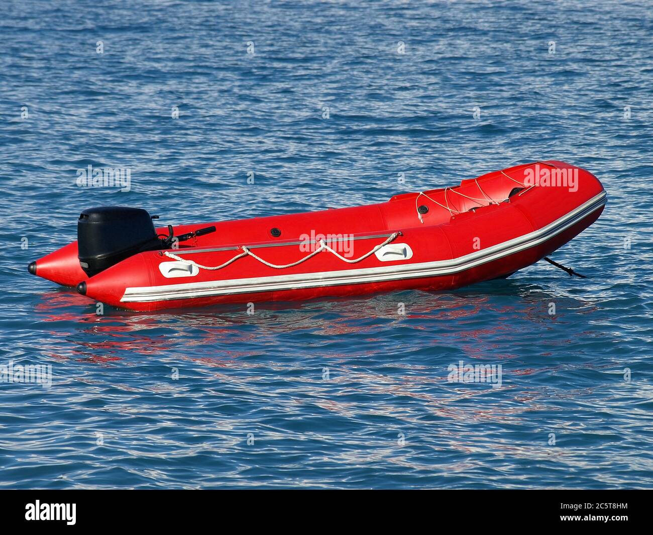 Red Inflatable Lifeboat Stock Photo - Alamy