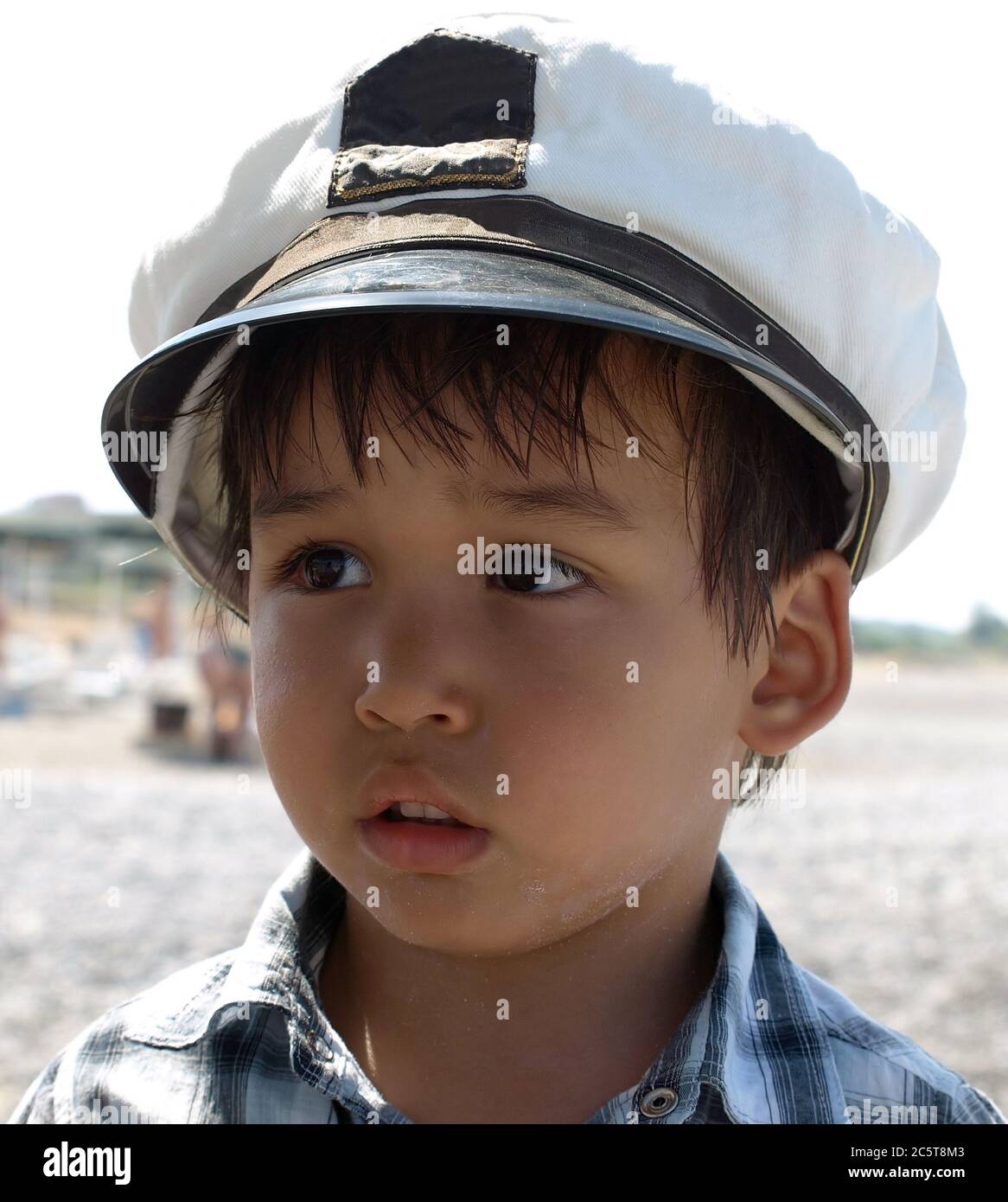 Portrait of funny little boy captain Stock Photo - Alamy