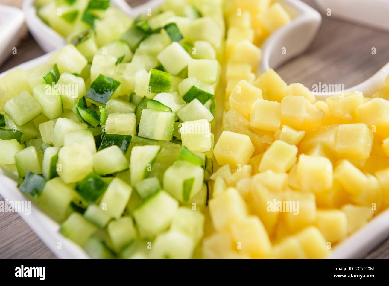 Kitchen cut potatoes cubes potatoes hi-res stock photography and images ...