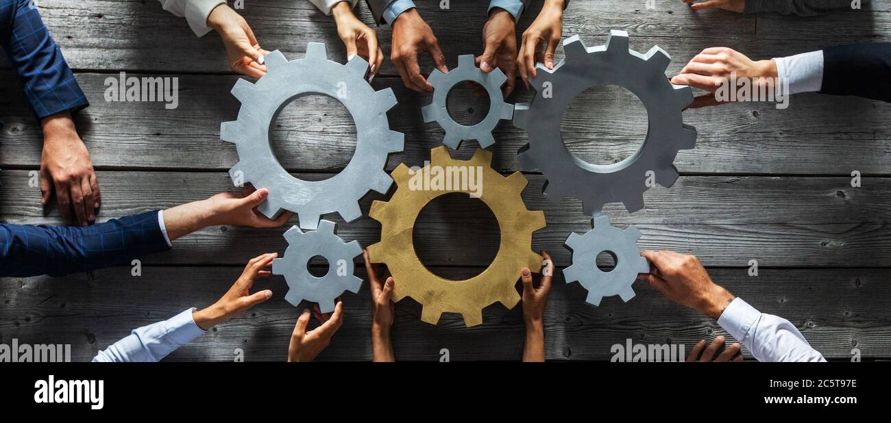 Business people teamwork gear together hi-res stock photography and ...