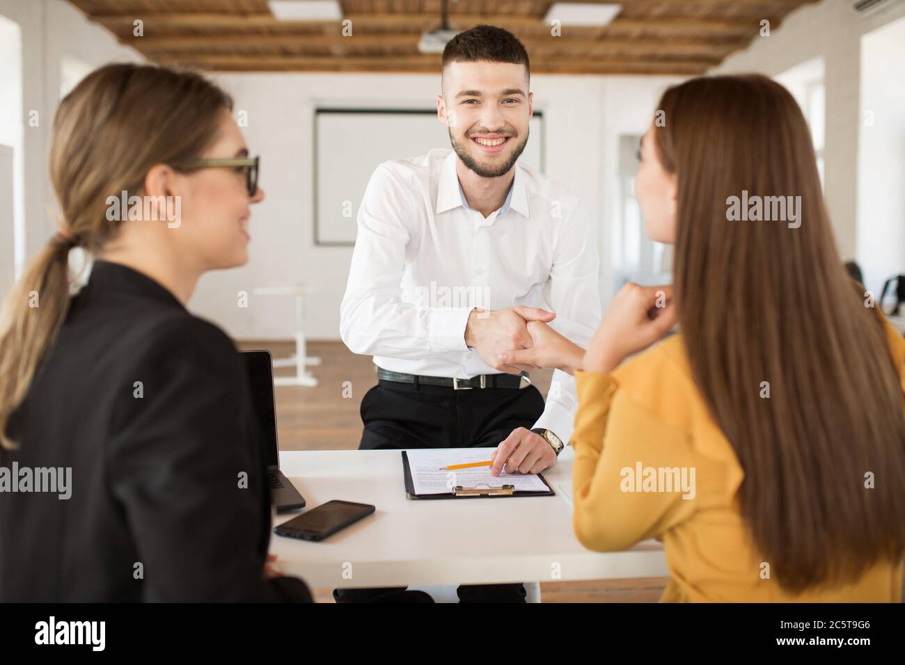 Ambitious businessman speaking looking camera hi-res stock photography ...