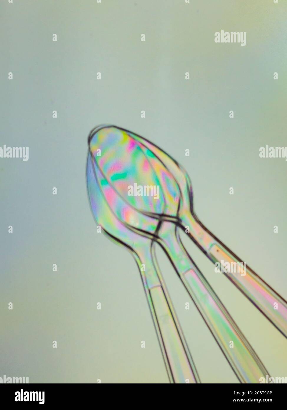 Colorful plastic spoons second life, elasticity photo technique Stock ...