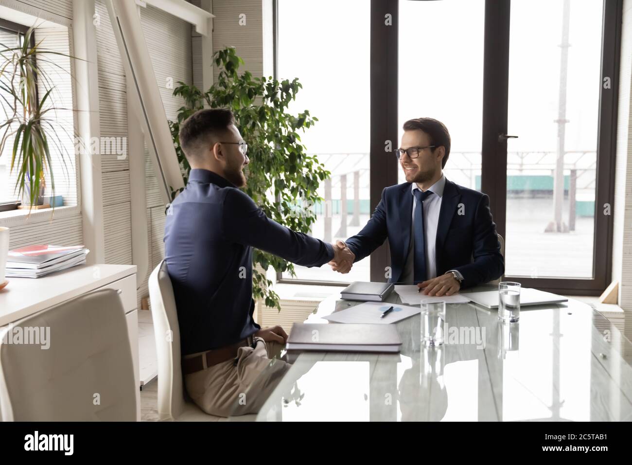 Businessmen insure hi-res stock photography and images - Alamy