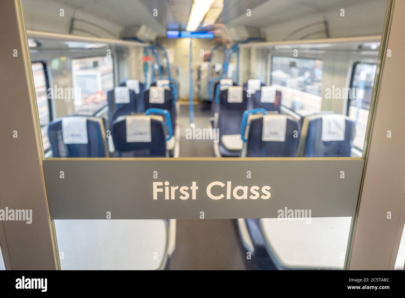 First-class section of a train travelling between Brighton and London ...