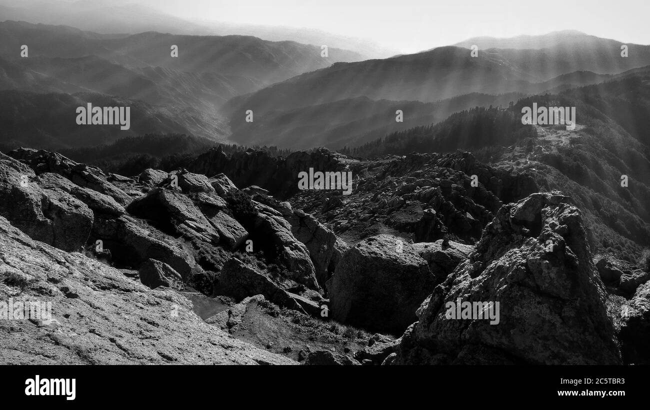Black and white mountain with backlight rays Stock Photo - Alamy