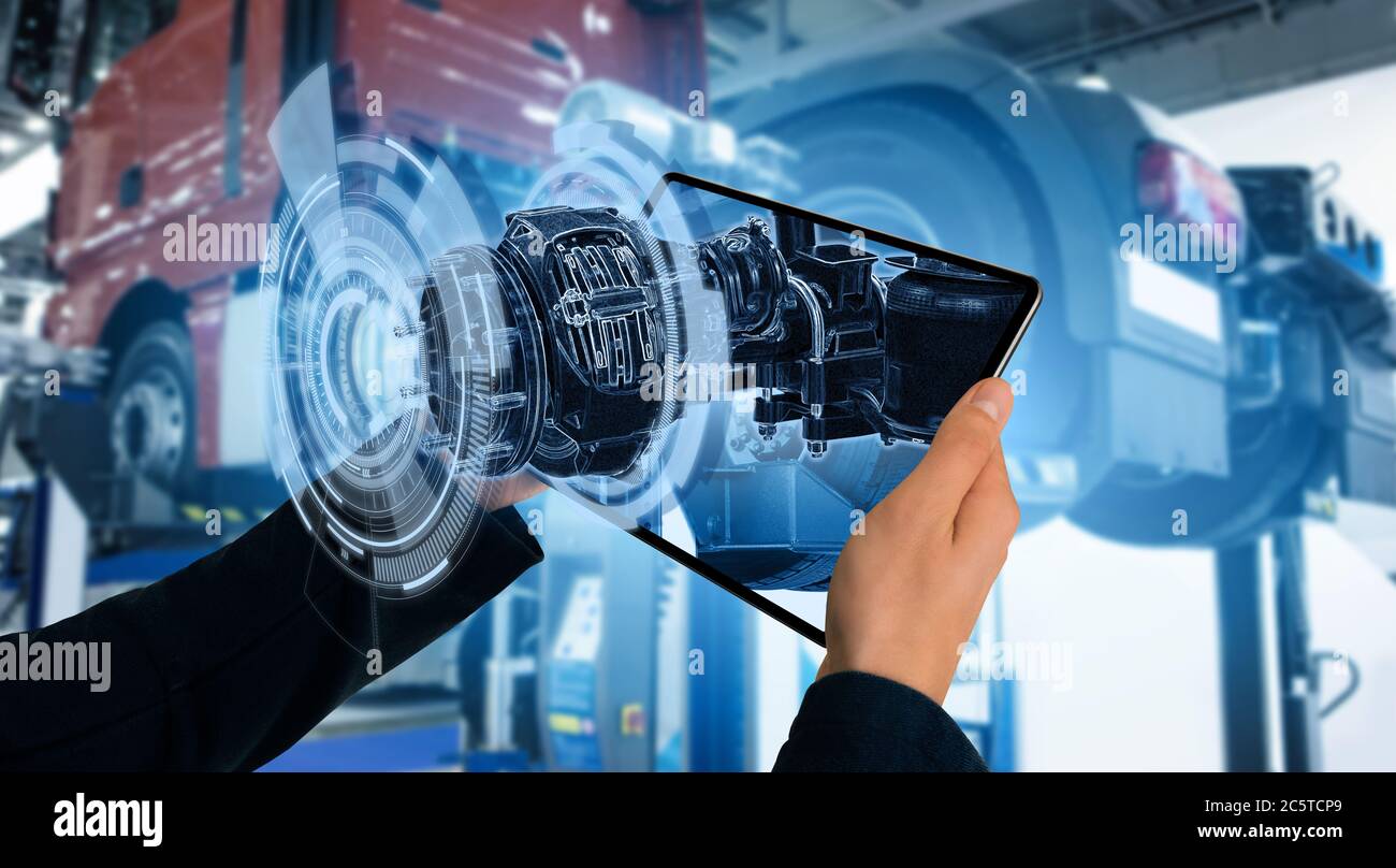 Repairing a truck with augmented reality Stock Photo - Alamy