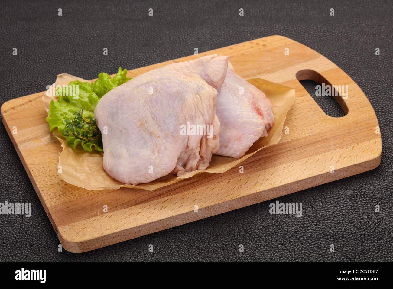 Raw chicken hip ready for cooking Stock Photo - Alamy