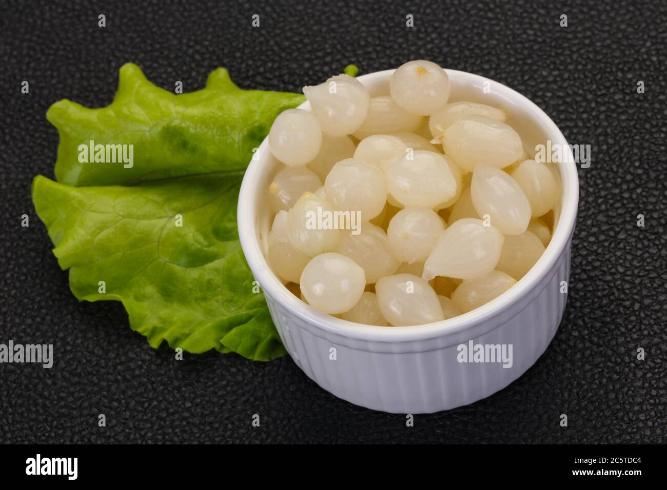 Pickled baby onion in the bowl Stock Photo - Alamy
