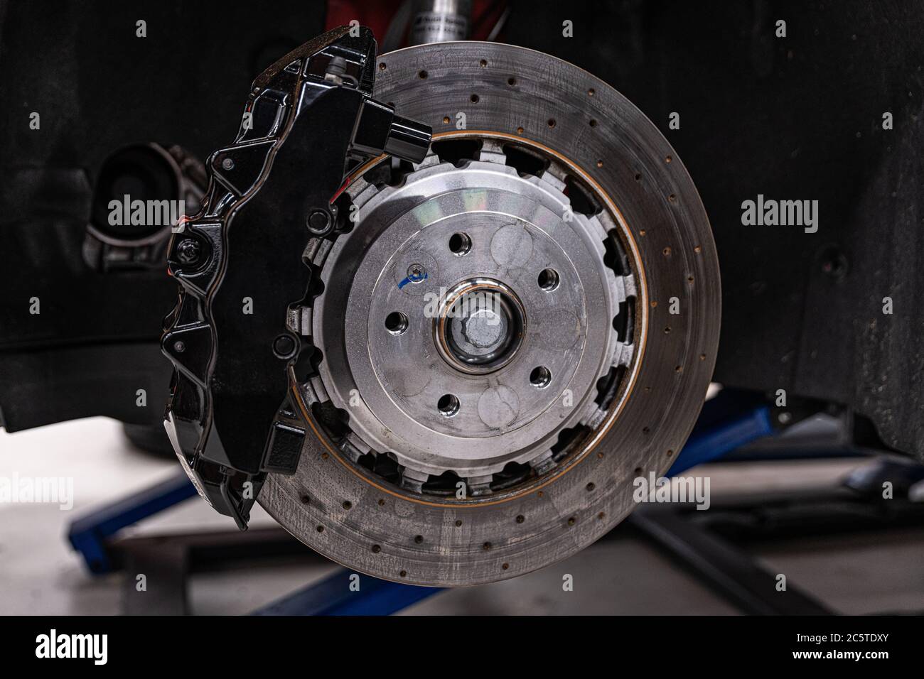 Modern sports car braking system and suspension Stock Photo - Alamy