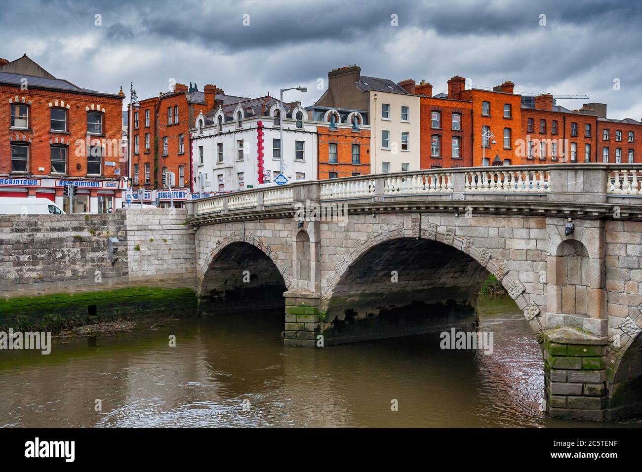 Mellows Bridge on River Liffey in city of Dublin, Ireland, arch stone ...