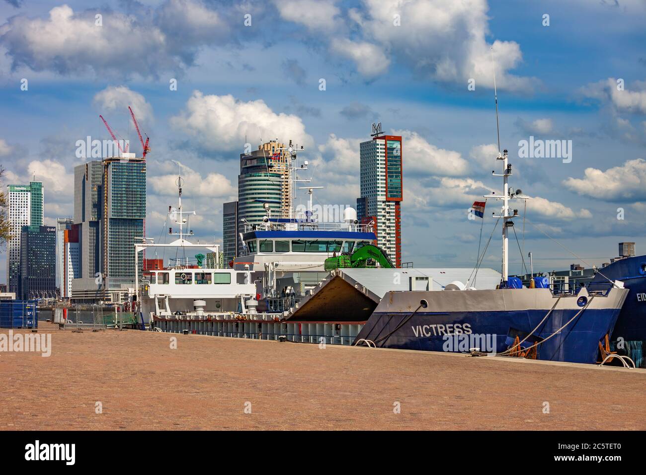 Rotterdam city quay, Victress General Cargo Ship at river waterfront ...