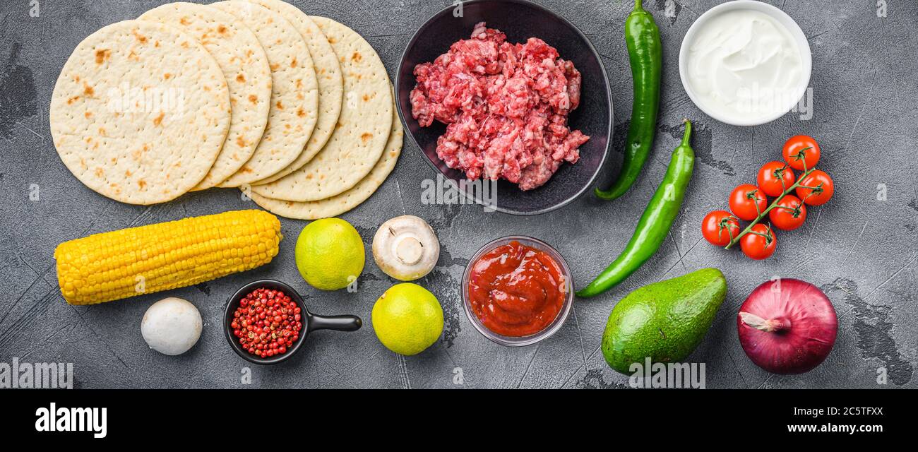 Traditional homemade taco ingredients with meat,salsa, peppers ...