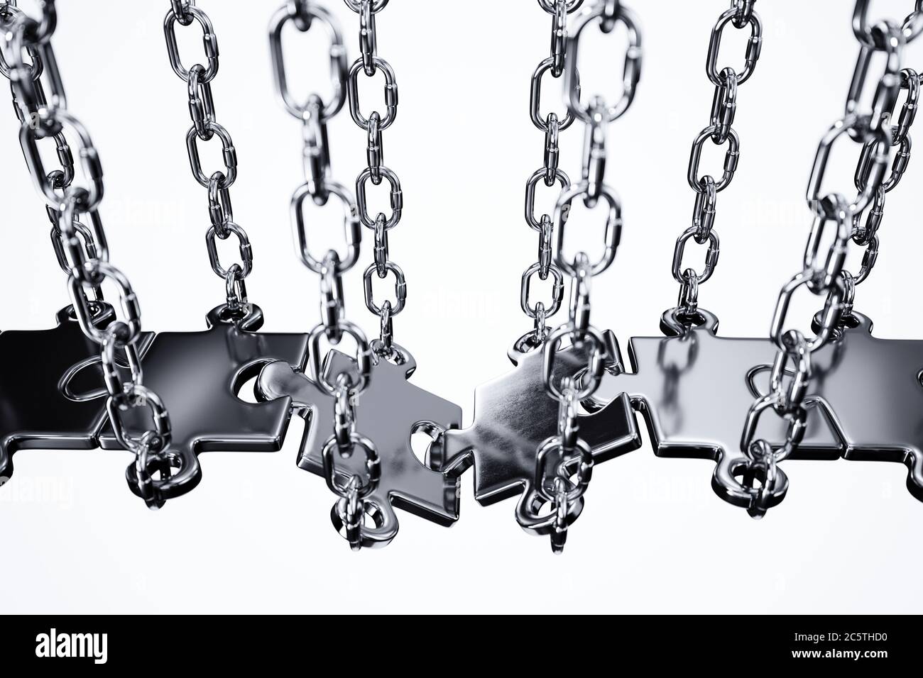 Metal chrome jigsaw puzzle successful bridge connection with chain over ...