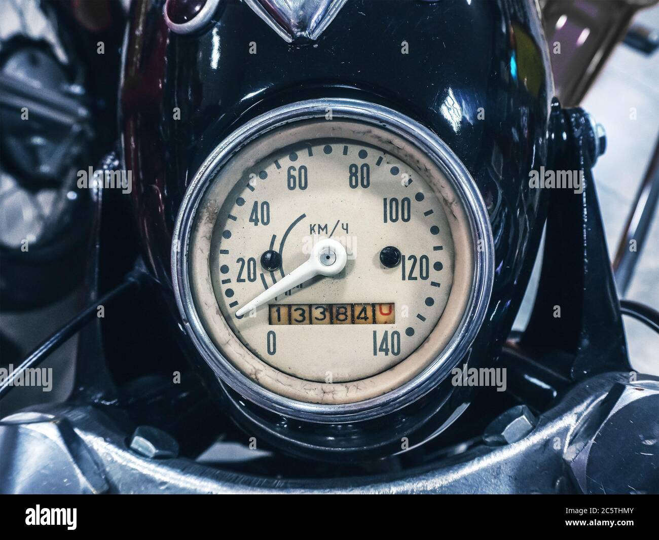 Round speedometer of an old Soviet black motorcycle. Closeup photo ...