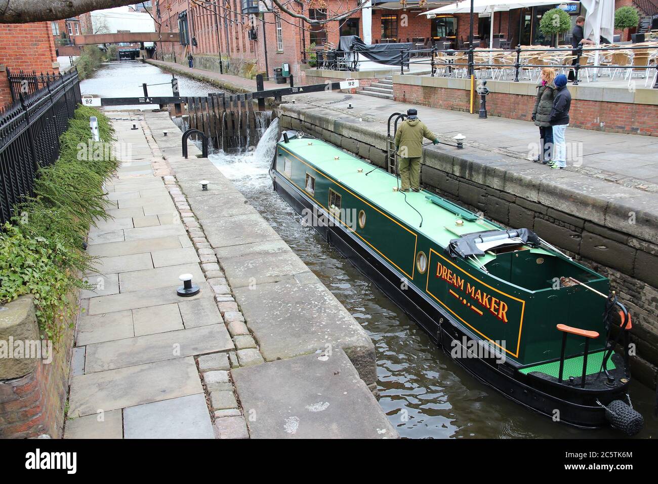 MANCHESTER, UK - APRIL 21, 2013: People visit Castlefield canal area in ...