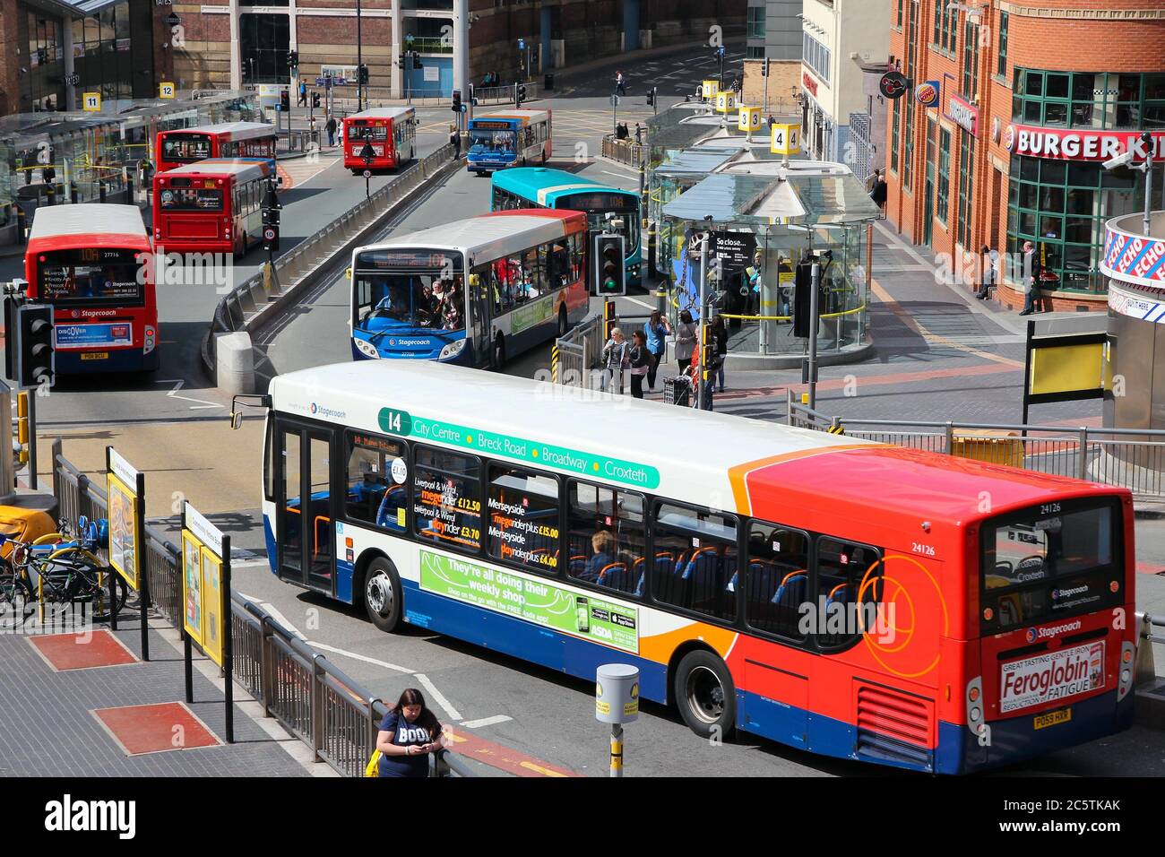 LIVERPOOL, UK - APRIL 20, 2012: People ride StageCoach buses on in ...