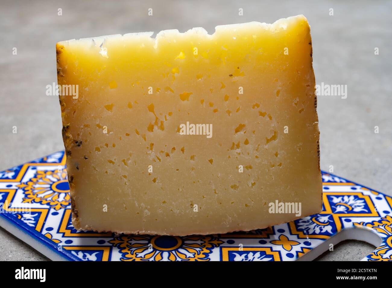 Spanish cheese manchego made from sheep milk close up Stock Photo - Alamy