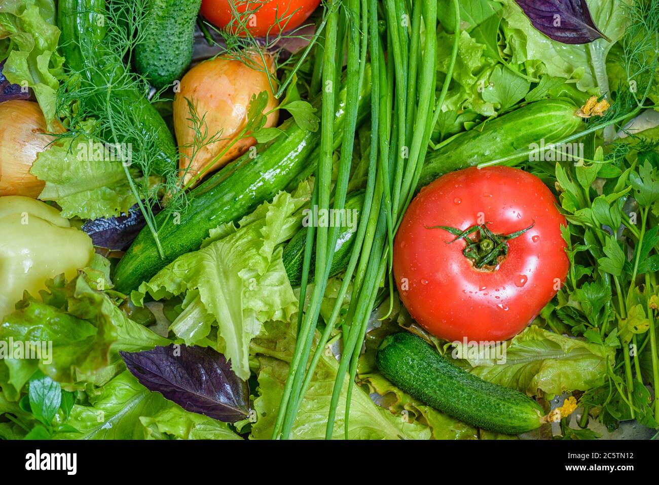 Wash vegetables before eating, very good for health. A group of ...