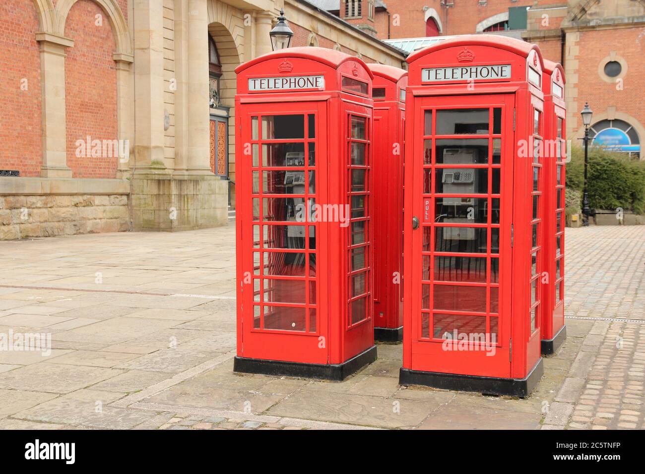 Bolton red telephone boxes. North West England, UK Stock Photo - Alamy