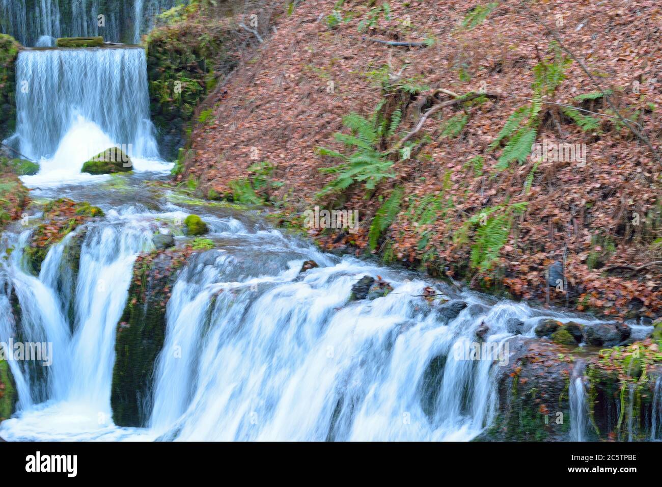 Beautiful Shiraito Waterfall at the base of volcanic mountain in ...