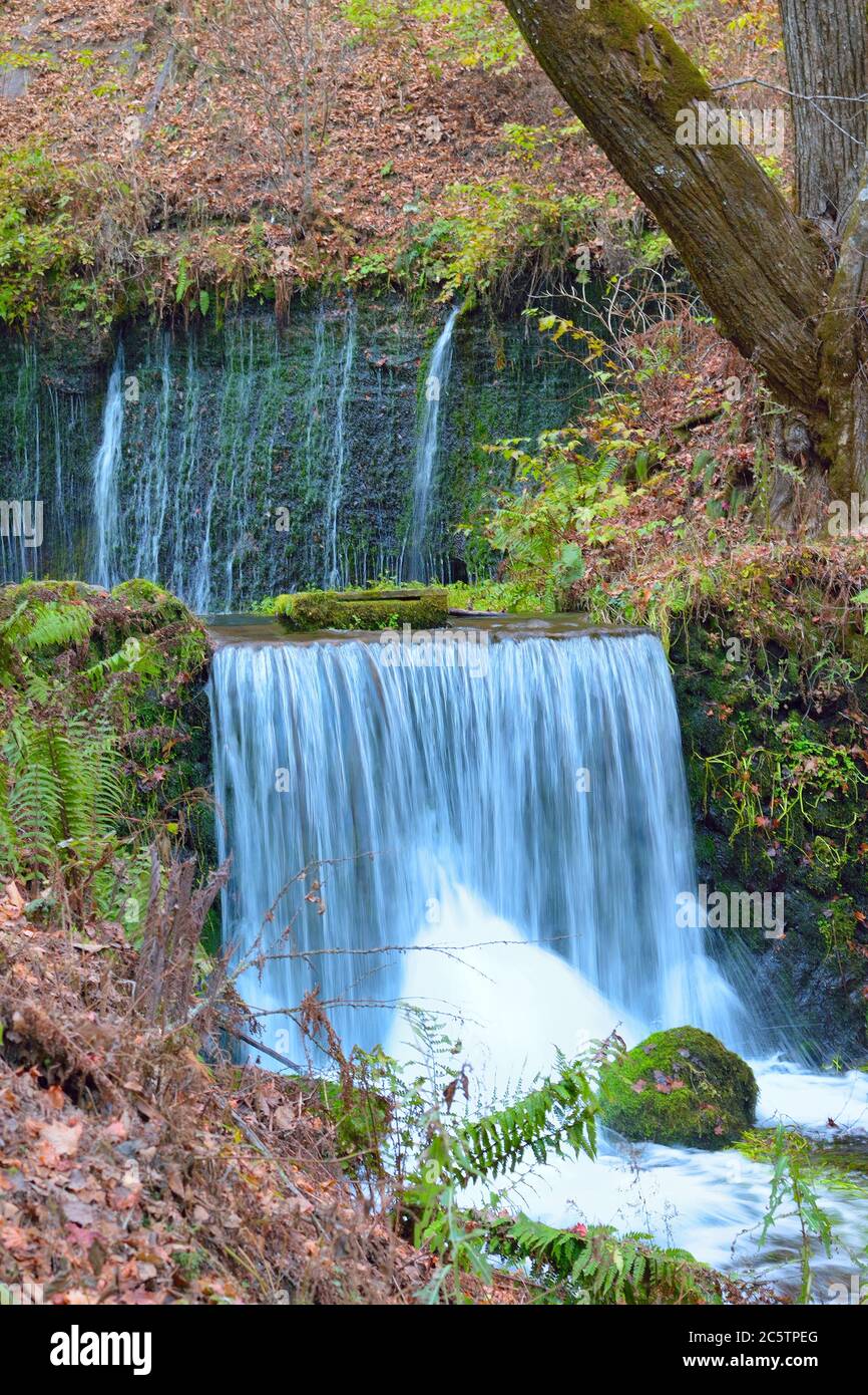 Beautiful Shiraito Waterfall at the base of volcanic mountain in ...