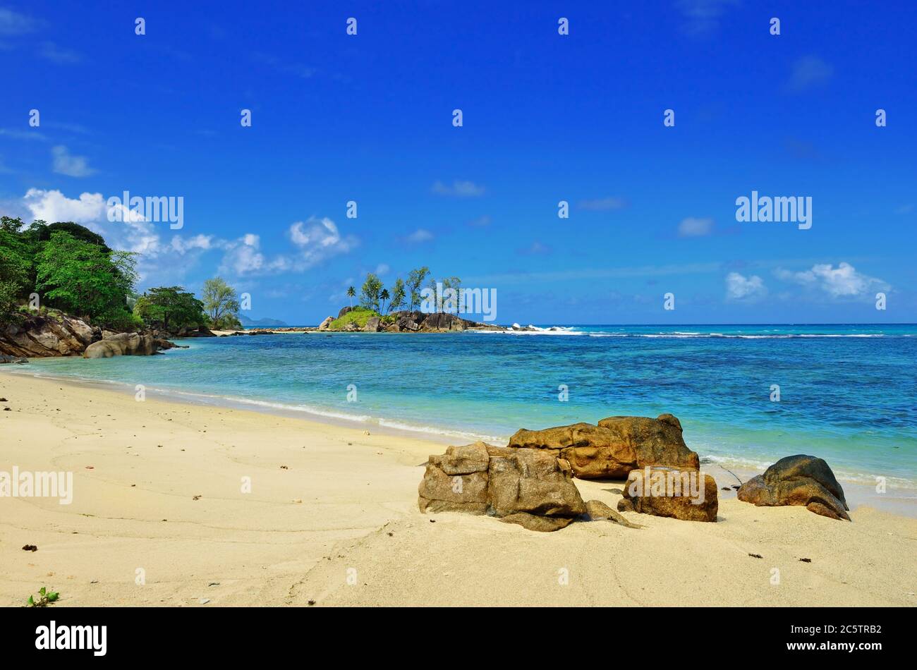 Granite rocky beaches on Seychelles islands, Mahe, Port Glaud, view at ...