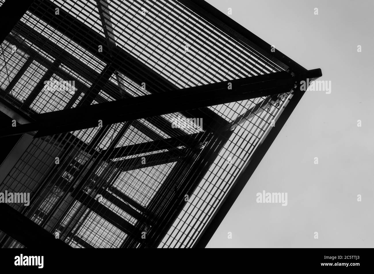 Metal fire escape structure of a building shot from below Stock Photo ...