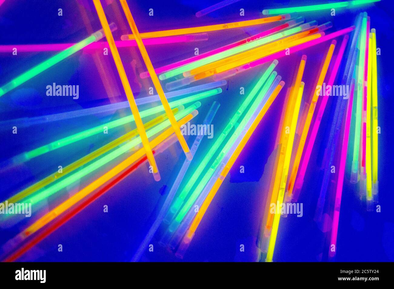 Colorful lights neon sticks Stock Photo - Alamy
