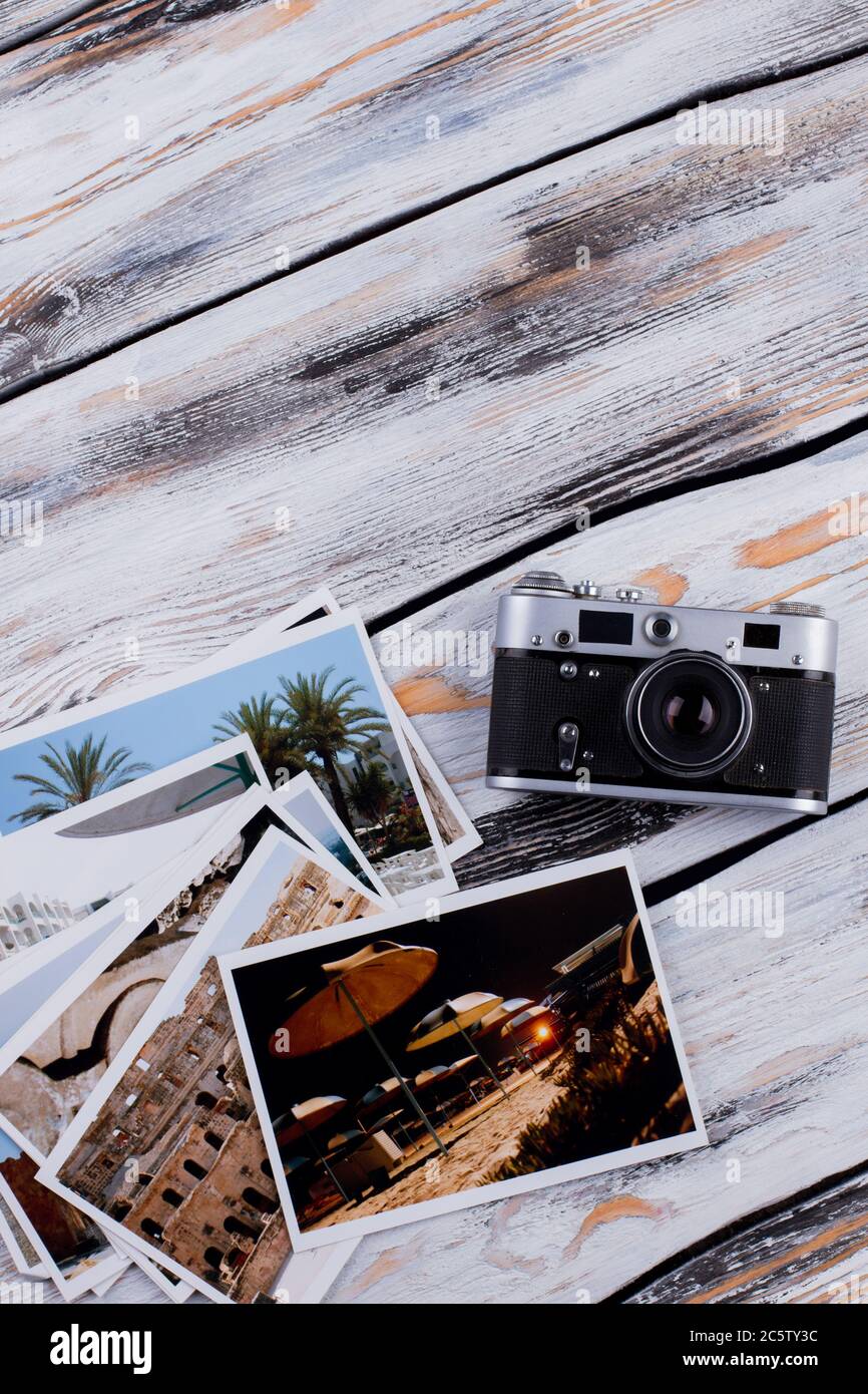 Flay lay vintage photo camera and summer vacation photos Stock Photo ...