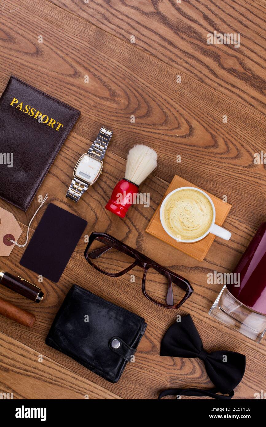 Items of a rich man on brown wood Stock Photo - Alamy