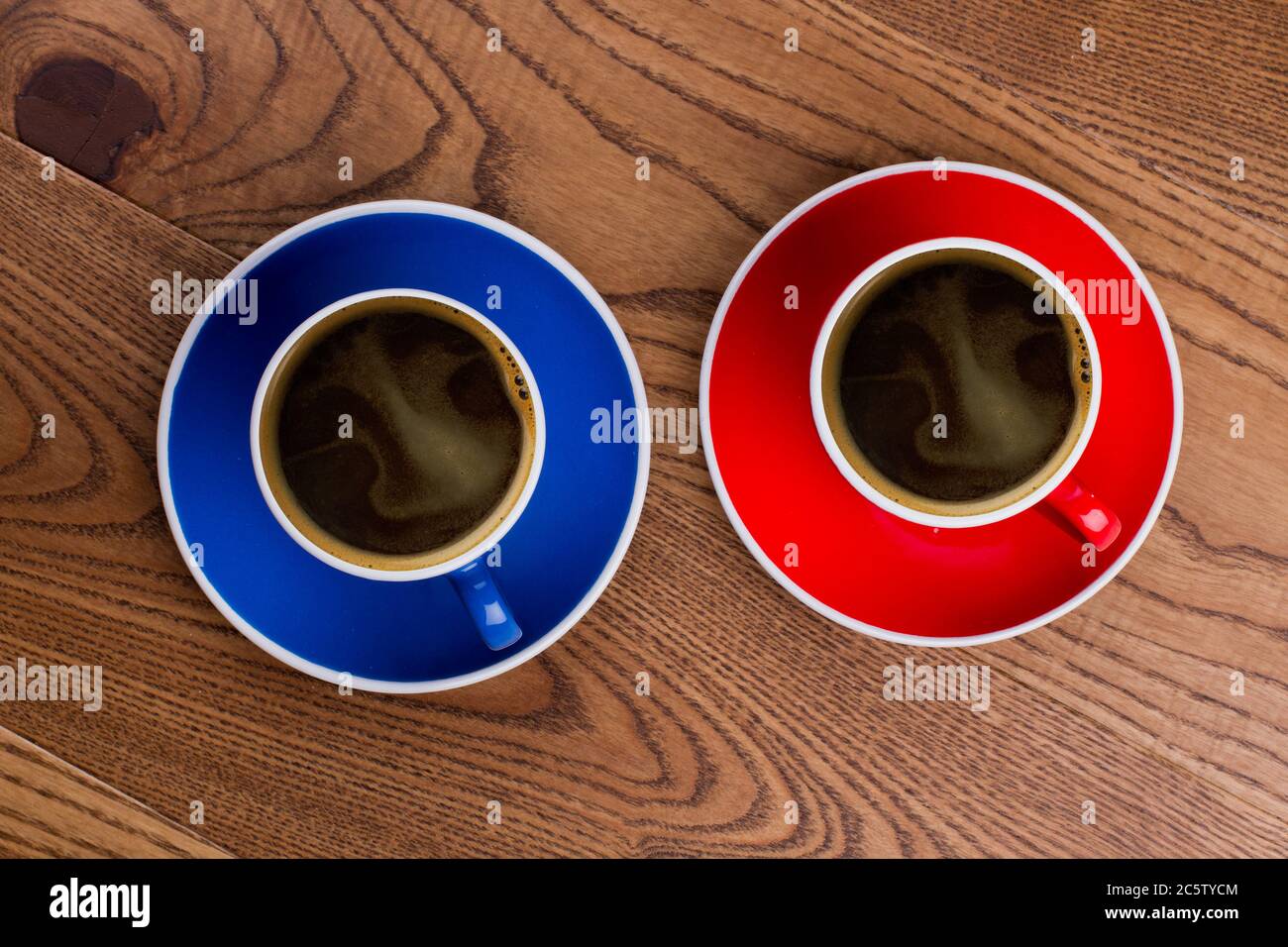 Two cups of hot coffee top view Stock Photo - Alamy