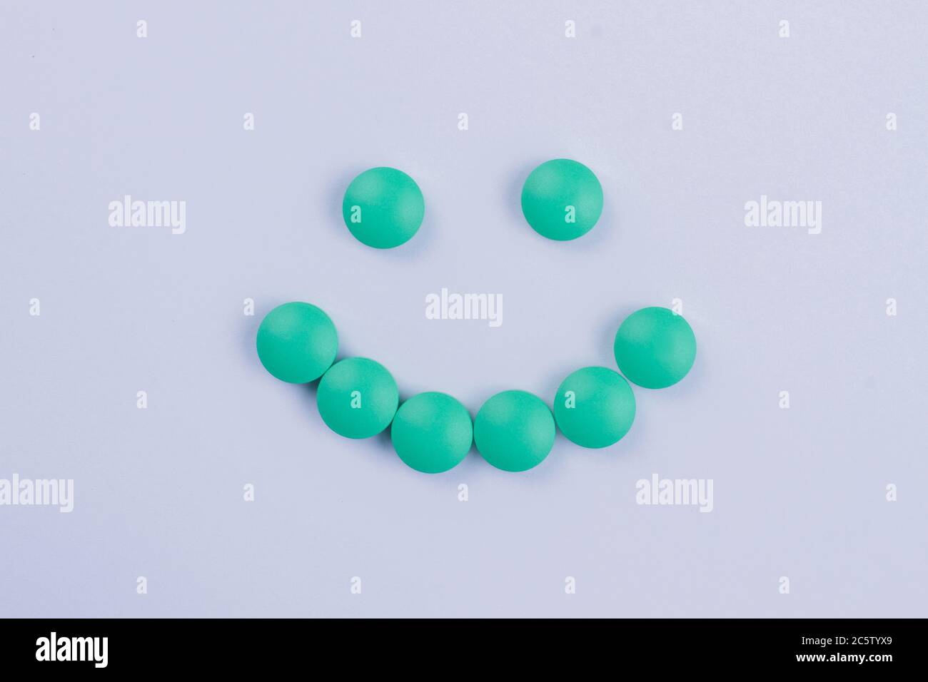 Smiley face pills hi-res stock photography and images - Alamy
