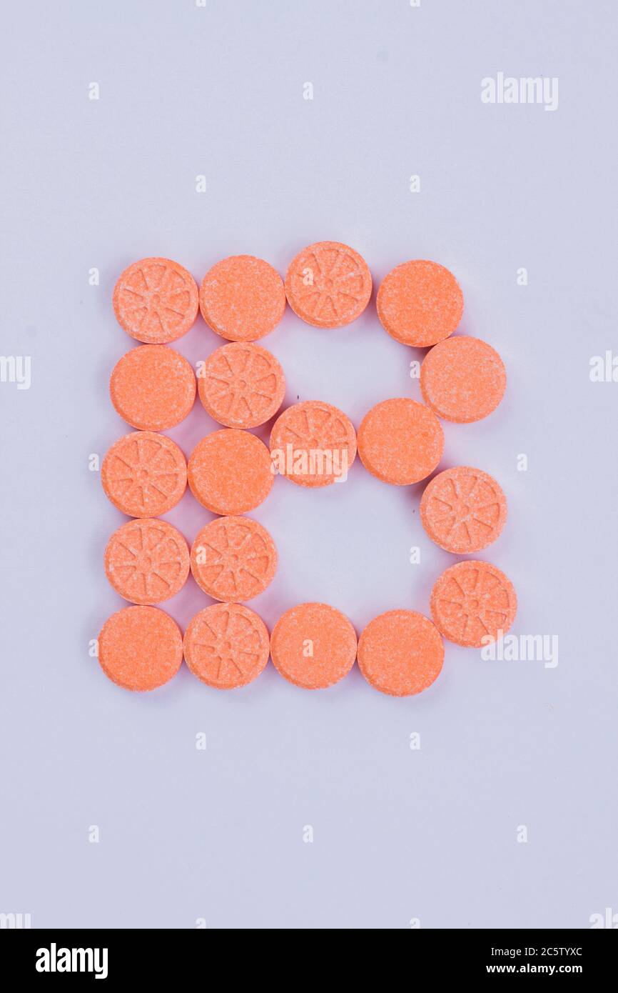 The letter B made of round pills Stock Photo - Alamy