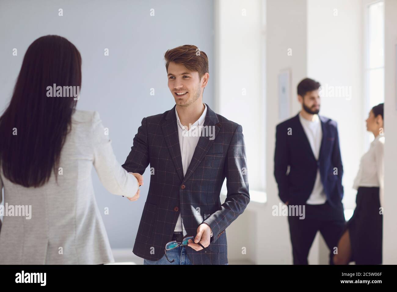 Handshake.Business people give a handshake at a meeting a successful ...